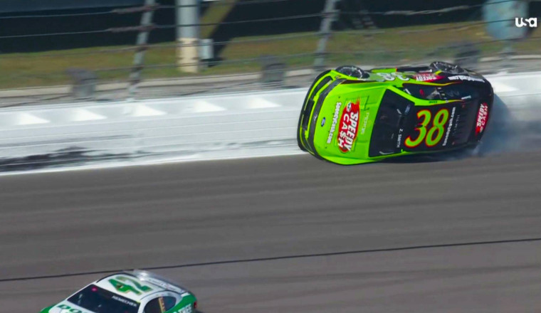 NASCAR driver rides wall in crash at Kansas Speedway (Video) | MotorBuzz